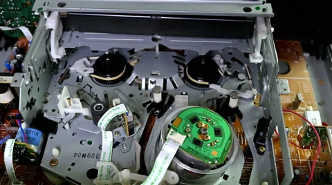 Inserting a VHS Tape into a VCR Player a... | Stock Video | Pond5