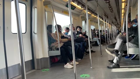 Inside view of Delhi metro full of peopl... | Stock Video | Pond5