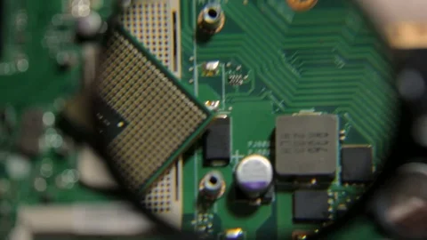 Inspection of the legs of the CPU with a... | Stock Video | Pond5