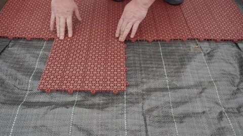 installation of plastic paving slabs for... | Stock Video | Pond5