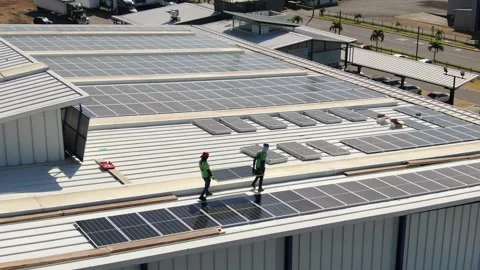 installation of solar panels on a wareho... | Stock Video | Pond5