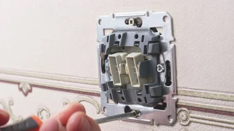 Installation of a switch. repair of elec... | Stock Video | Pond5