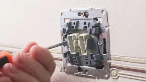 Installation of a switch. repair of elec... | Stock Video | Pond5
