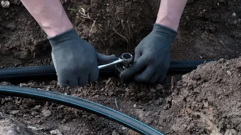 installation of a water supply system fr... | Stock Video | Pond5