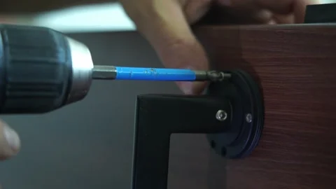 installing a lock on the door, tightenin... | Stock Video | Pond5