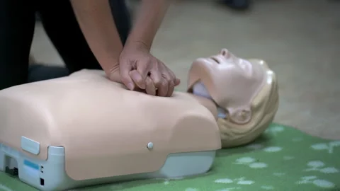 Instructional CPR technique demonstratio... | Stock Video | Pond5