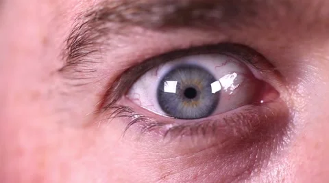 Intense terrified eye close up, blue mal... | Stock Video | Pond5