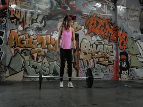 Intense workout in dark gym: strained yo... | Stock Video | Pond5