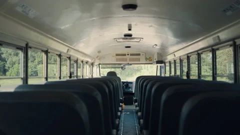 Interior empty school bus closeup. Rows ... | Stock Video | Pond5