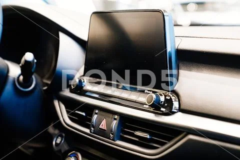 Interior of new KIA car in car dealership. navigation and control ...