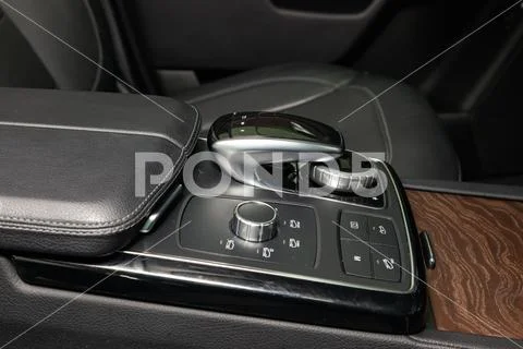 Interior view with multimedia joystick and dashboard of luxury very ...