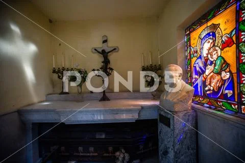 Interior view of a tomb with stained glass at the La Recoleta Cemetery ...