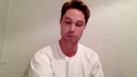 Interview with actor Kai Luke Brummer ta... | Stock Video | Pond5