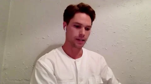 Interview with actor Kai Luke Brummer ta... | Stock Video | Pond5