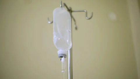 Intravenous drip bottle on pole,infusion... | Stock Video | Pond5