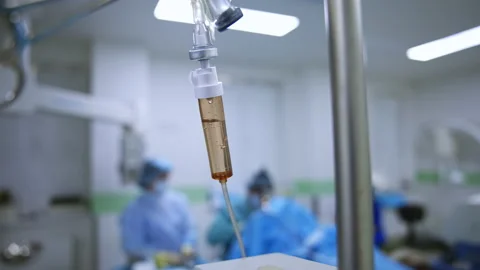 Intravenous drip hanging in the surgery ... | Stock Video | Pond5