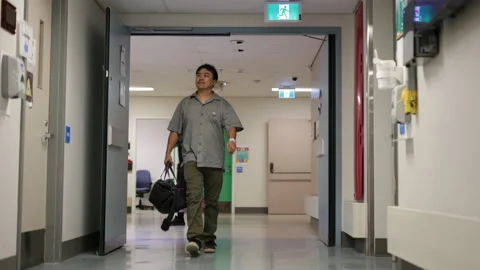 Inuit man checking into a hospital for t... | Stock Video | Pond5