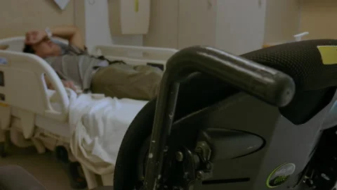Inuit man lying in a hospital bed | Stock Video | Pond5