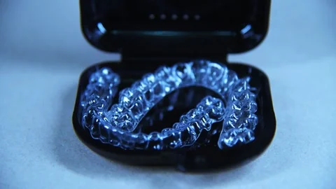 Invisalign transparent aligners rotate i... | Stock Video | Pond5
