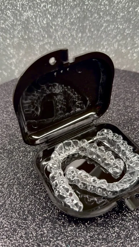 Invisalign transparent aligners rotate i... | Stock Video | Pond5