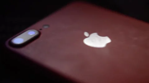 iphone camera and apple logo on a night ... | Stock Video | Pond5
