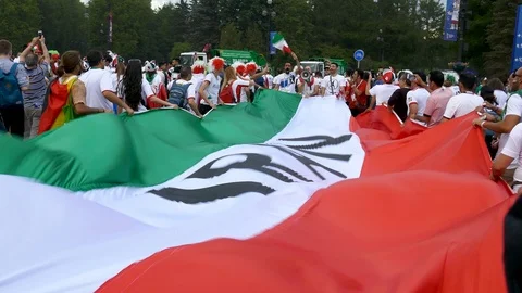 Iranian crowd of fans in street waving a... | Stock Video | Pond5