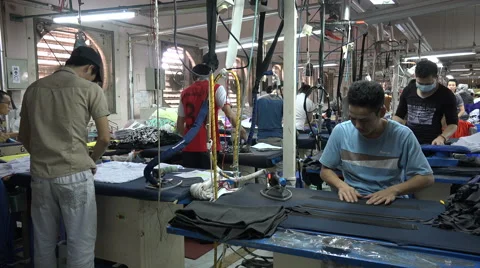 Ironing textile in a garment factory, cl... | Stock Video | Pond5