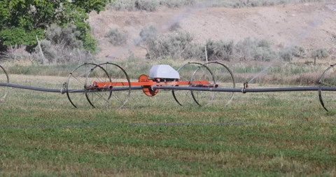 Irrigation wheel line motor farm agricul... | Stock Video | Pond5