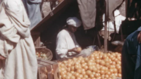 Islamic Men Covered with Hijab Selling O... | Stock Video | Pond5