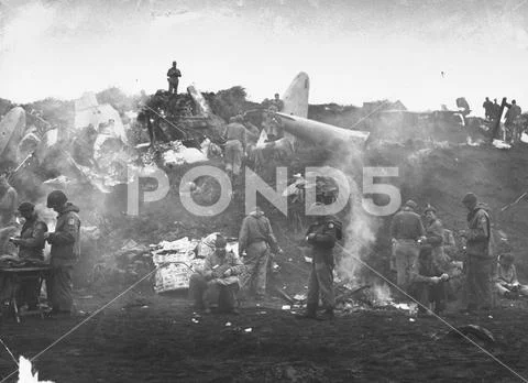 On the island of Kiska, men building fires and cooking their meals near ...