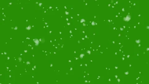 Isolated falling snow on a green screen ... | Stock Video | Pond5
