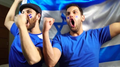 Israeli fans holding the national flag | Stock Video | Pond5