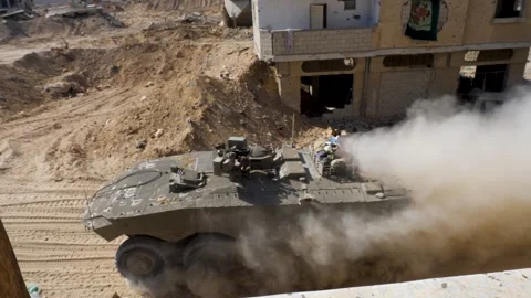 Israeli Merkava battle tank driving thro... | Stock Video | Pond5
