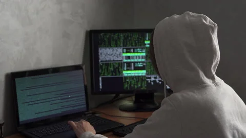 IT programmer working on a computer in a... | Stock Video | Pond5