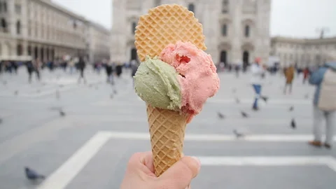 Italian ice cream cone held in hand on t... | Stock Video | Pond5