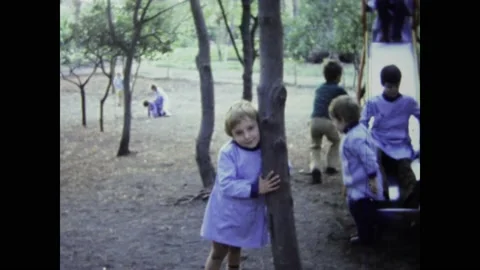 Italy 1968, Children Playing on a Slide ... | Stock Video | Pond5