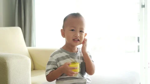 Itchy Boy Scratching Face | Stock Video | Pond5
