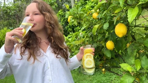 it's just a lemon paradise, a teenage gi... | Stock Video | Pond5