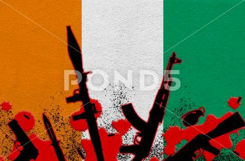 Ivory Coast flag and various weapons in red blood. Concept for terror ...