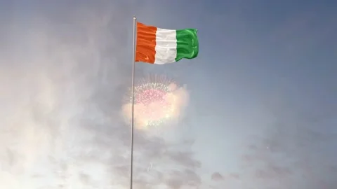 Ivory Coast flag sky morning fire works | Stock Video | Pond5