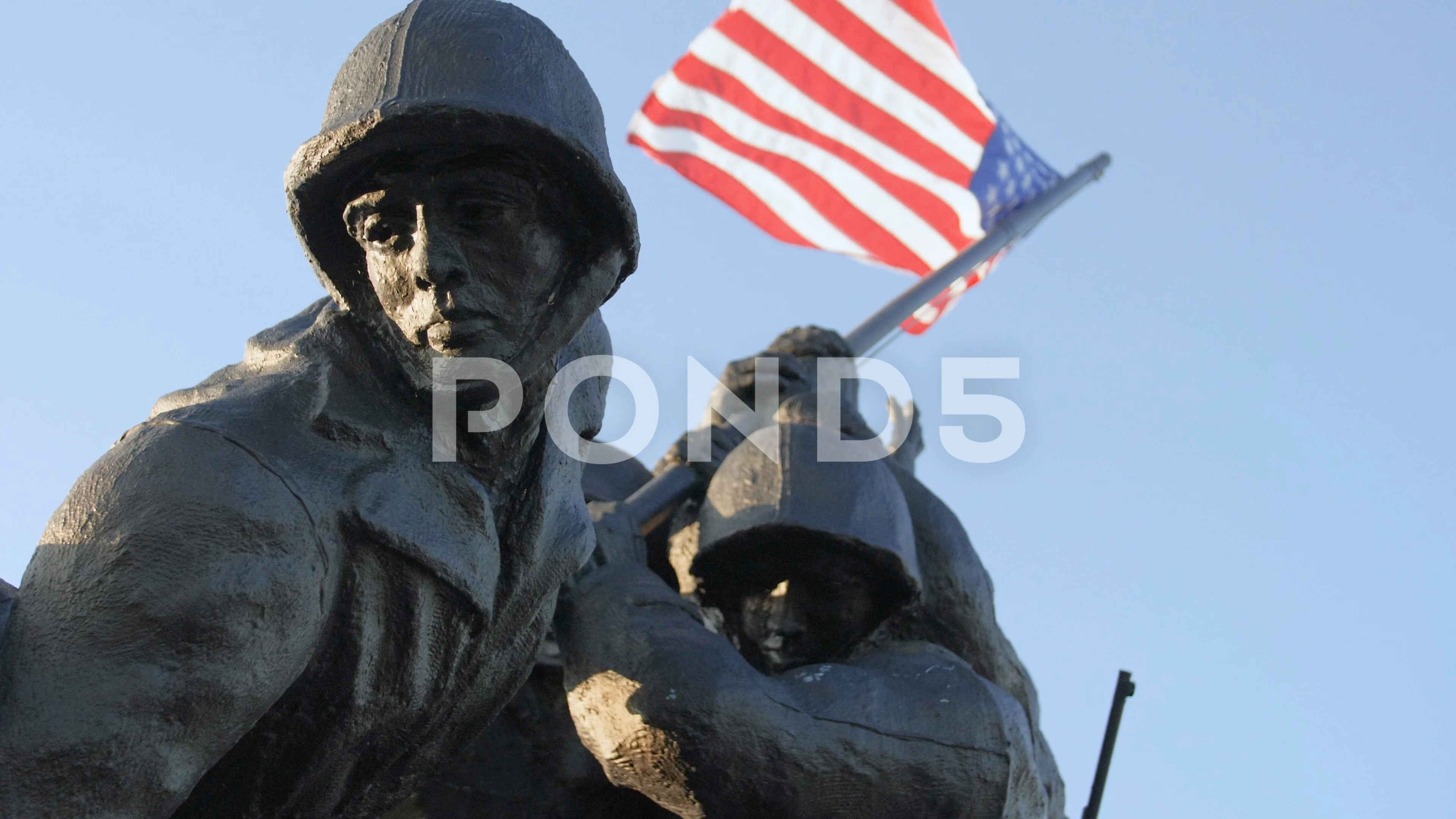 Statue Of American Soldiers Holding Flag