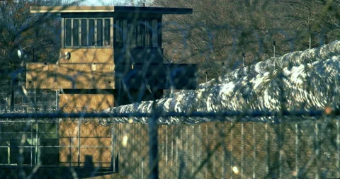 Jail, correctional facility. Razor wire ... | Stock Video | Pond5