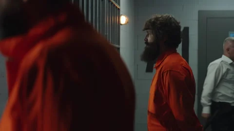 Jailer with police baton walks, watches ... | Stock Video | Pond5