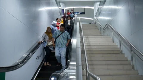 Jakarta MRT - people using down stairs a... | Stock Video | Pond5