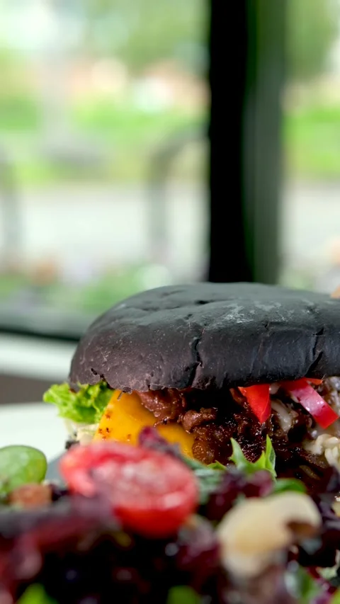 Japanese Black Burger with Cheese. Chees... | Stock Video | Pond5