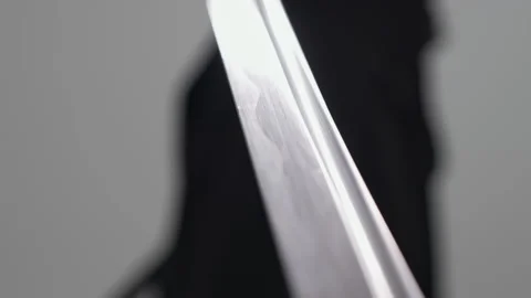 Japanese man, samurai, holds in his hand... | Stock Video | Pond5