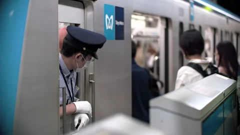 Japanese Train conductor check boarding ... | Stock Video | Pond5