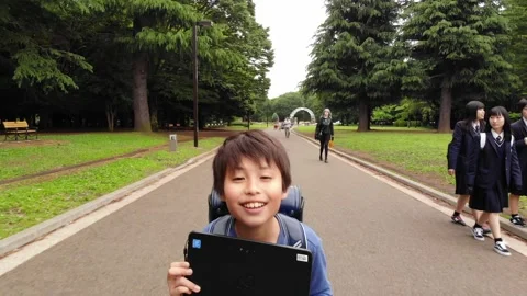 Japanese Young Boy Filming with his comp... | Stock Video | Pond5