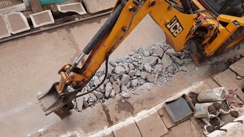 JCB Bulldozer digger Digging road In Con... | Stock Video | Pond5