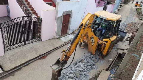 JCB Bulldozer Tractor Digging Soil / gra... | Stock Video | Pond5